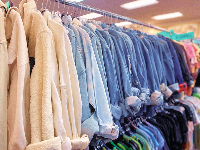 The denim wall—where jeans of every shade of blue stand at attention, waiting for their perfect match to walk by.