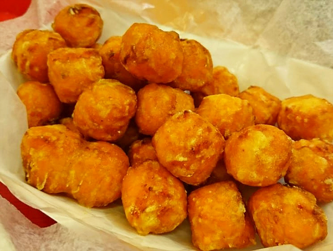 Sweet potato tots that achieve the impossible: crispy exteriors giving way to fluffy, sweet interiors. Popping these like candy should be mandatory.