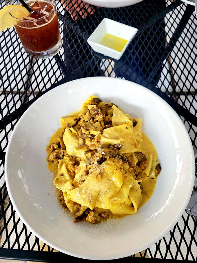 Wide ribbons of pasta embracing a hearty sauce like old friends reuniting. This is the kind of dish that makes you cancel your evening plans.