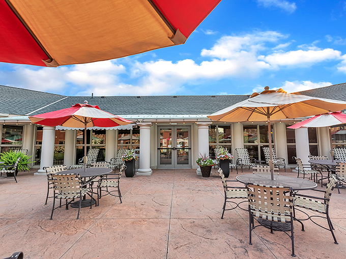 The Inn's patio invites you to linger under umbrellas, where coffee conversations stretch pleasantly into afternoon appetizers.