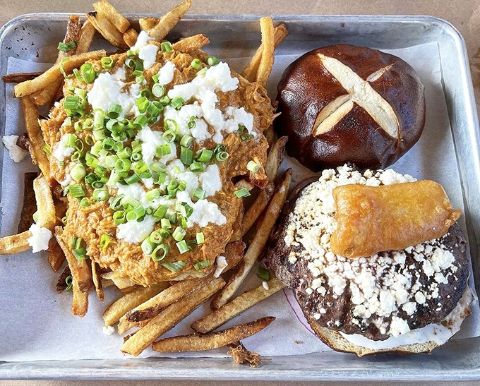 Fries that could make a Frenchman weep, paired with a burger that demands your respect. This tray doesn't just hold food&mdash;it cradles dreams.