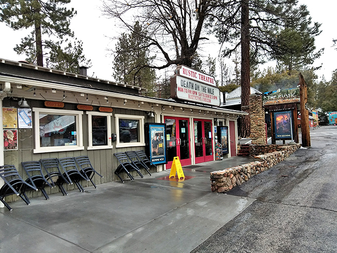 The Rustic Theatre &ndash; where Hollywood premieres may be miles away, but movie magic feels right at home. Those red doors promise entertainment mountain-style.