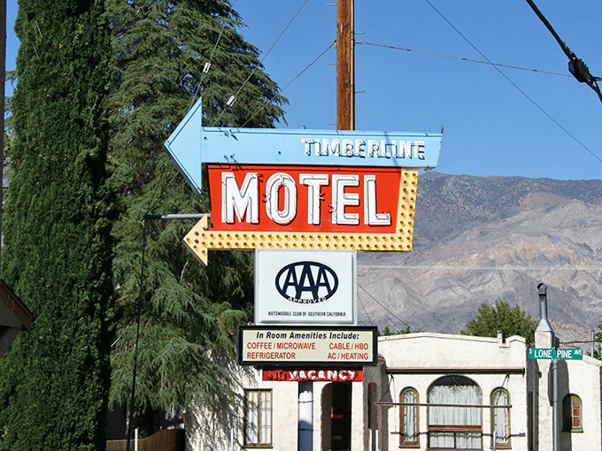 The Timberline Motel's vintage sign promises all the modern conveniences of the mid-20th century, with a side of nostalgia and mountain views.
