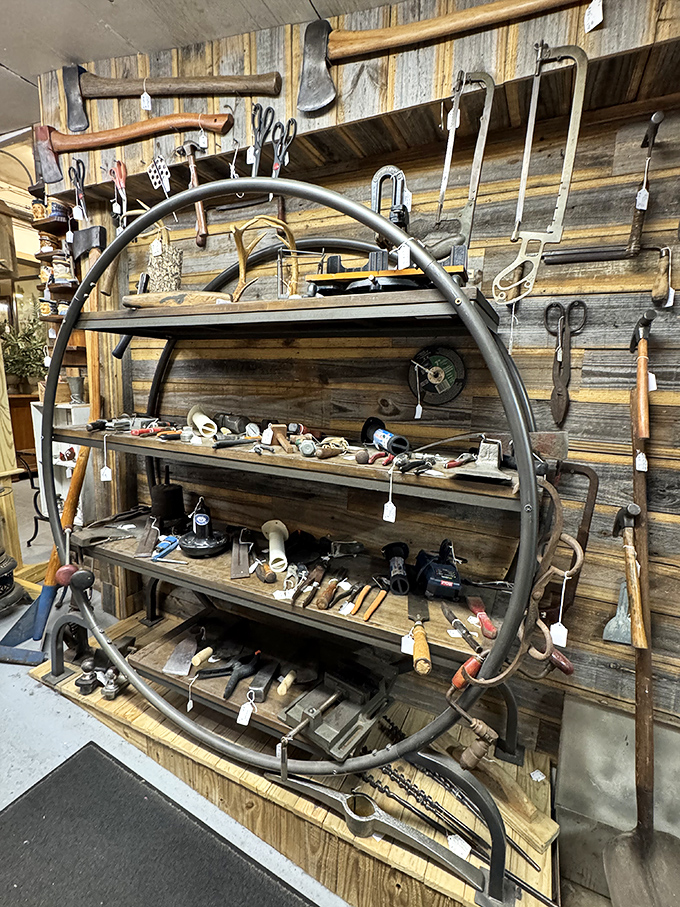 This wall of vintage tools isn't just for handymen&mdash;it's an industrial art installation where function meets rustic design history.