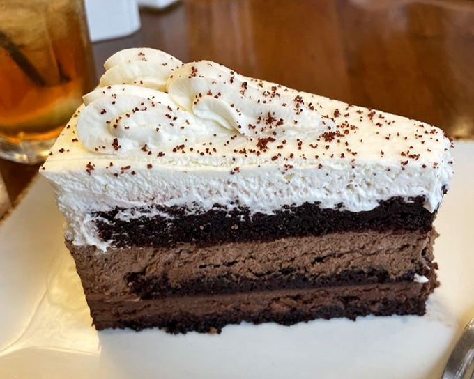 Three layers of chocolate decadence proving that yes, you always have room for dessert.