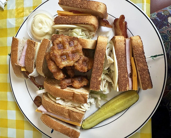 A triple-decker club that requires jaw exercises beforehand&mdash;layers of satisfaction held together by the toothpicks of tradition.