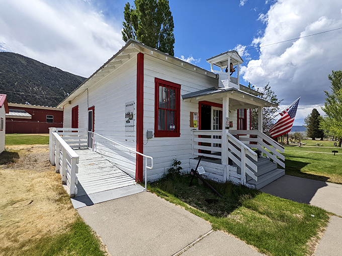 This historic white building with its crisp red trim and American flag stands as a reminder that small-town America still thrives in mountain pockets.