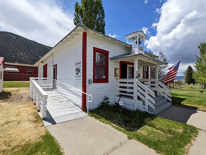 This historic white building with its crisp red trim and American flag stands as a reminder that small-town America still thrives in mountain pockets.
