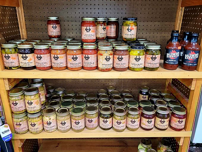 Mason jars lined up like edible jewels. These homemade preserves and sauces are what souvenir dreams are made of.