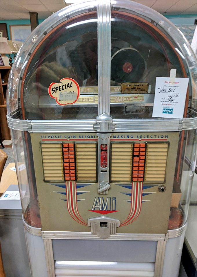 This vintage jukebox isn't just furniture&mdash;it's a time machine that accepts quarters instead of plutonium. Probably played "Margaritaville" more times than Jimmy Buffett himself.
