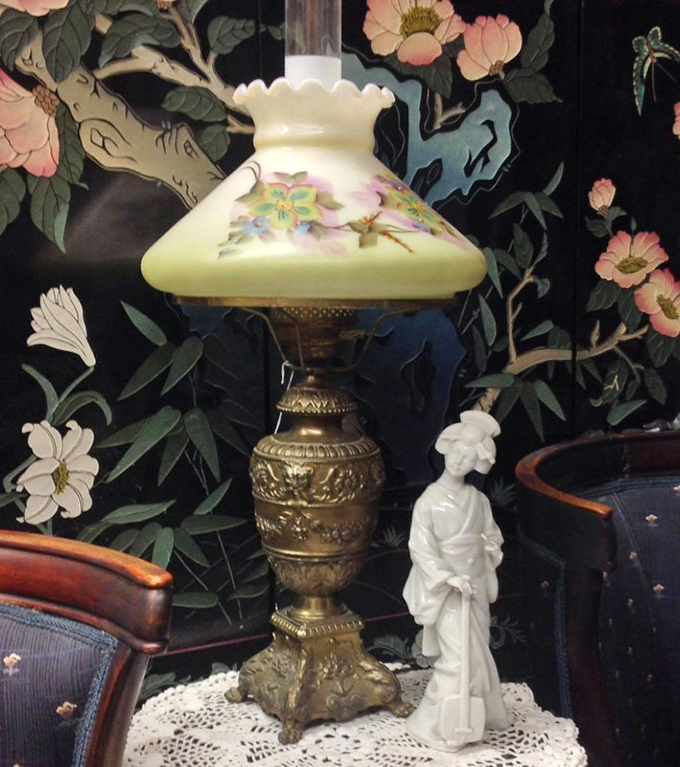 This vintage metal lamp combines industrial strength with artistic flair, proving that functional can also be absolutely fabulous.