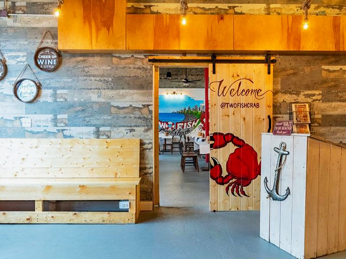 A sliding barn door with a painted crab invites you into seafood paradise. It's like the pearly gates, if heaven smelled like garlic butter.