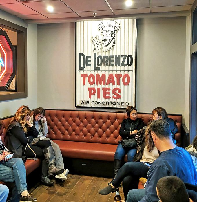 The vintage sign watches over waiting diners like a promise: good things come to those who wait&mdash;especially tomato pies.