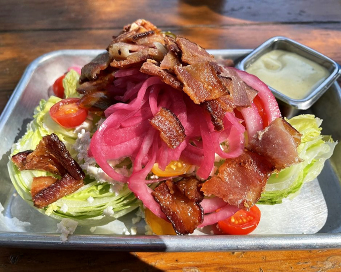 The wedge salad&mdash;reinvented with pickled onions and bacon that would make even your vegan friend consider a "cheat day."
