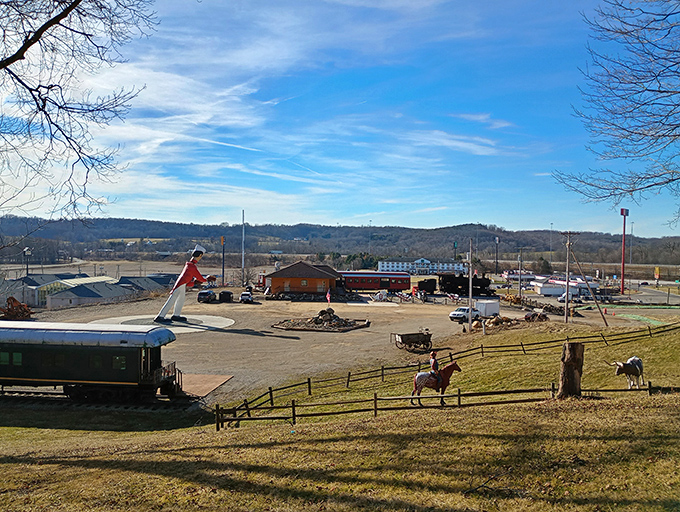 The bobblehead stands as the centerpiece of a charming collection of Americana, from trains to farm animals.