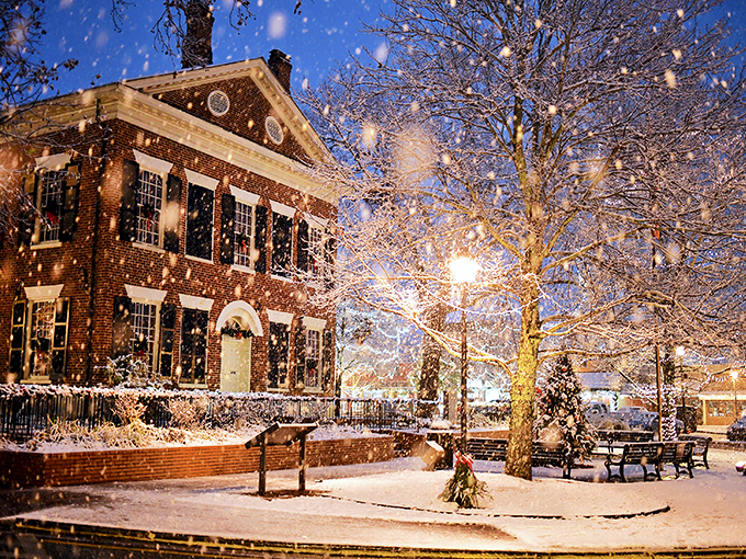 Snowflakes dance around the historic courthouse in winter, transforming Dahlonega's square into a scene worthy of the best holiday movies.