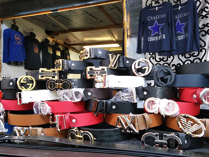 Designer-inspired belts and sports merchandise create a fashion buffet for the style-conscious bargain hunter. Labels matter less than swagger when the price is right.