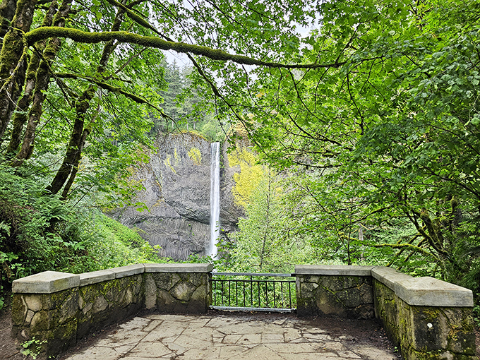 Nature's perfect frame: This stone viewpoint creates the ideal composition for waterfall viewing&mdash;no filter needed for this ready-made masterpiece.