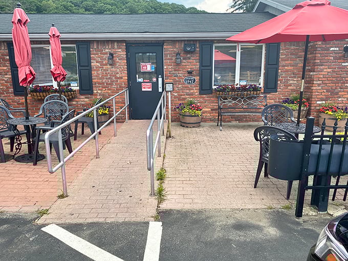 The entrance that welcomes all, flanked by flower boxes that add a touch of color to your impending sugar-fueled adventure.
