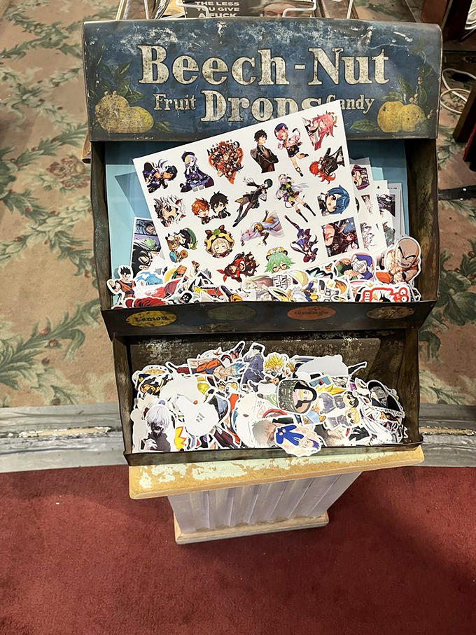 An old Beech-Nut display finds new purpose housing anime stickers &ndash; proof that vintage containers and modern fandoms make surprisingly perfect roommates.