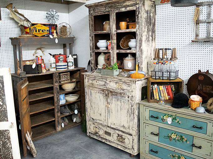 Perfectly curated chaos&mdash;weathered cabinets displaying everyday items that have somehow transformed from "old stuff" to "cherished Americana" with the simple passage of time.