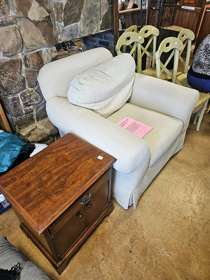 Sink into comfort without sinking your budget. This cozy armchair and wooden side table create an instant reading nook.