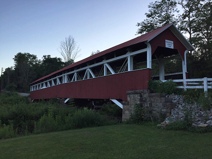 Twilight softens the bridge's silhouette against the darkening sky. Even photographers who've "seen it all" pause to capture this moment.
