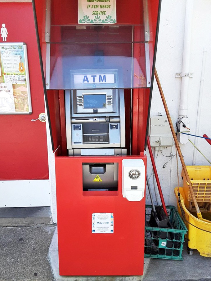 The ATM stands ready for the cash-only policy. In an age of digital everything, there's something refreshingly honest about a place that still deals in paper.