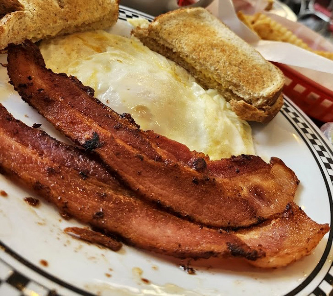 Bacon that's achieved that perfect crisp-yet-substantial texture alongside eggs with sunset-yellow yolks. This is breakfast as nature intended.