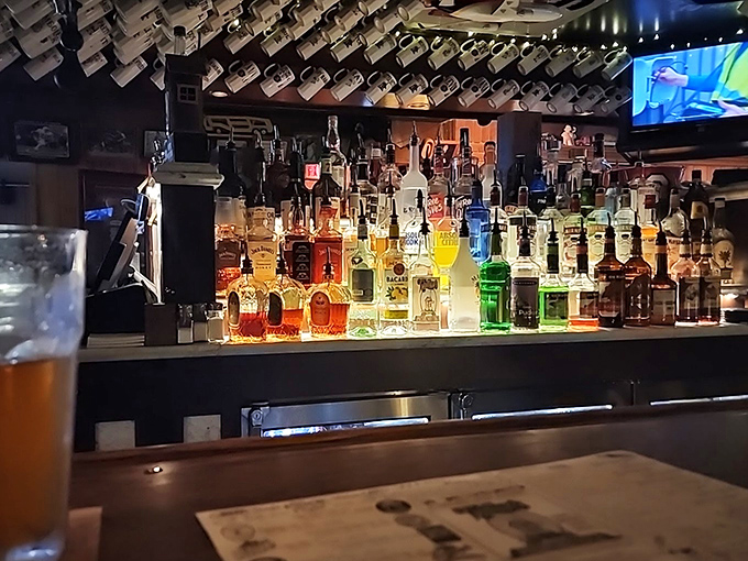 A bar lineup that reads like a novel with a very happy ending. Those bottles aren't just stored&mdash;they're displayed like the treasures they are.