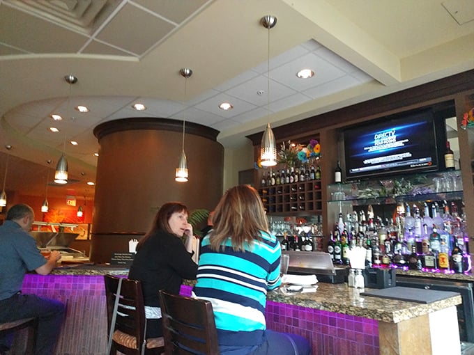 The bar area&mdash;where strangers become friends and friends become regulars over perfectly mixed drinks and shared appetizers.