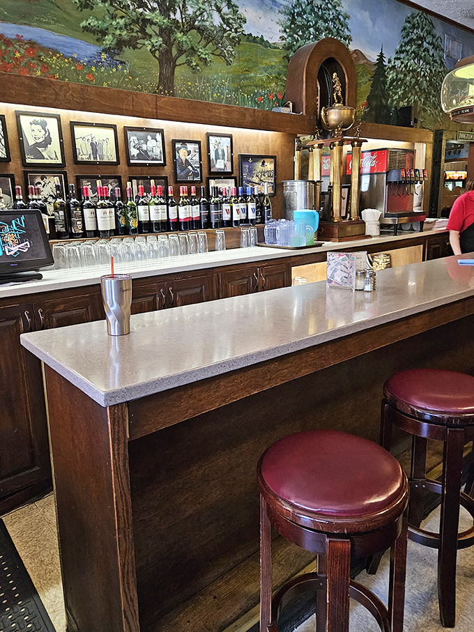 The bar area feels like a neighborhood living room. Vintage photos and trophies tell stories of Akron's history while wine bottles stand at attention.