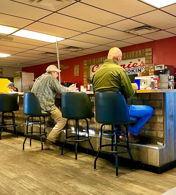 The counter is where regulars become family and first-timers become regulars. Coffee tastes better when served with a side of local wisdom.