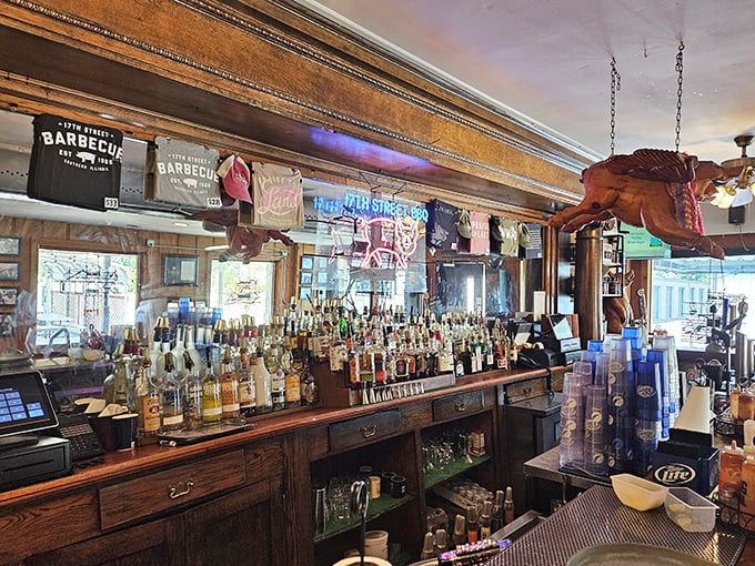 A bar stocked for celebrating BBQ victories or drowning the sorrows of having to wait until tomorrow to eat here again.