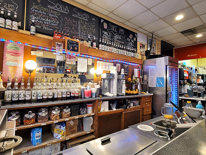 The soda fountain command center, where milkshakes are born and fountain drinks flow like liquid happiness.