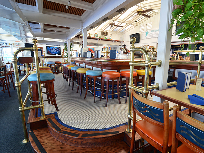 The bar area's brass railings and colorful stools invite you to pull up a seat and swap tales of the one that got away.