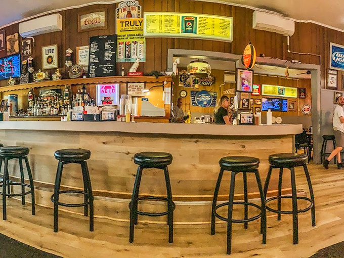A bar that tells stories through its worn wood and neon signs &ndash; where locals have been solving the world's problems one beer at a time.