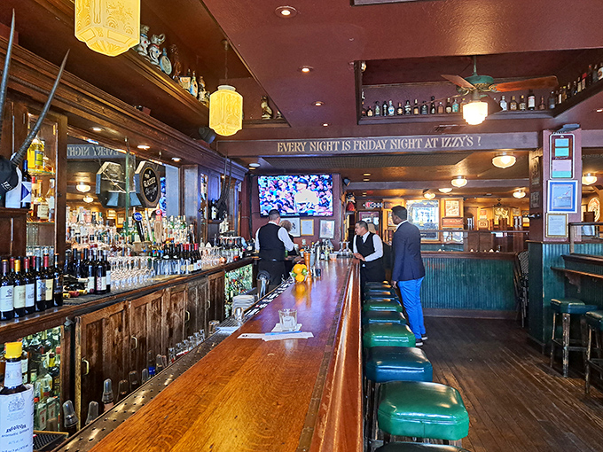 The bar beckons with promise of perfectly crafted cocktails and the kind of atmosphere that makes strangers become friends.