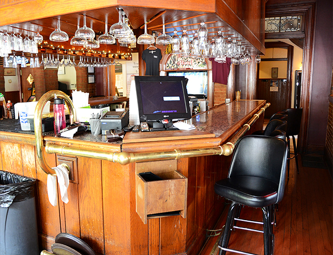 The bar area balances old-school charm with modern efficiency. Where locals debate basketball, weather, and the eternal question: tenderloin or burger today?