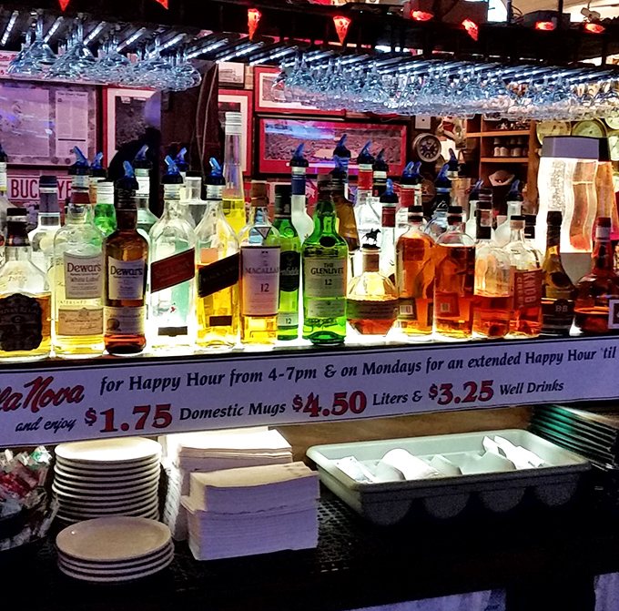 The bar area glows with promise and premium spirits. Happy hour prices that make you wonder if you've time-traveled back to the 1990s.