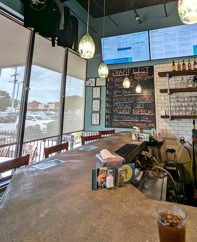 Pull up a seat at the bar where local craft beers flow and pendant lights cast a golden glow over your chips and guac ritual.