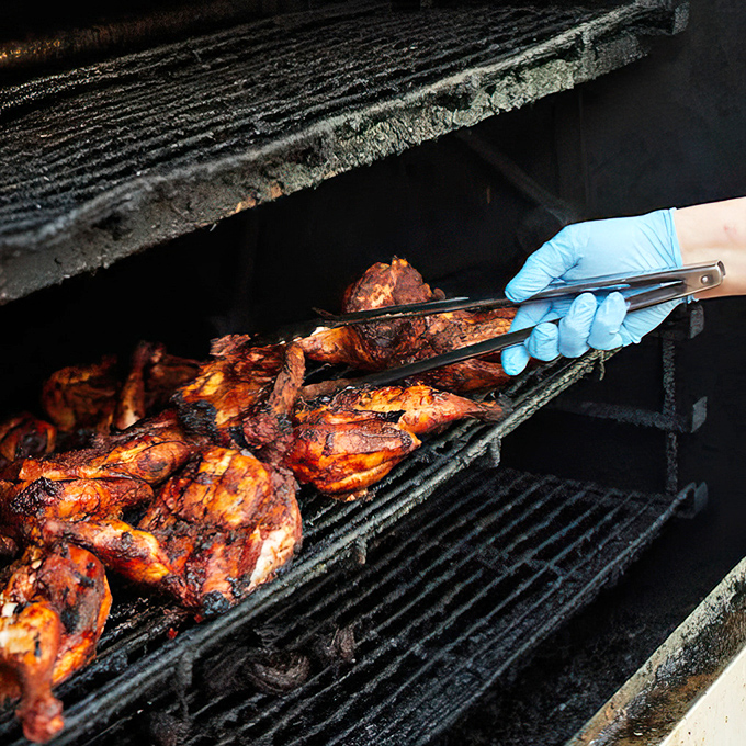 Someone's working the grill with the focus of a surgeon, except the patients here are delicious and nobody's complaining.