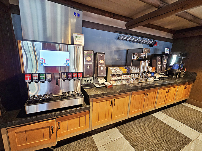 The beverage station stands ready to fuel your morning adventure with coffee, juice, and caffeinated courage.