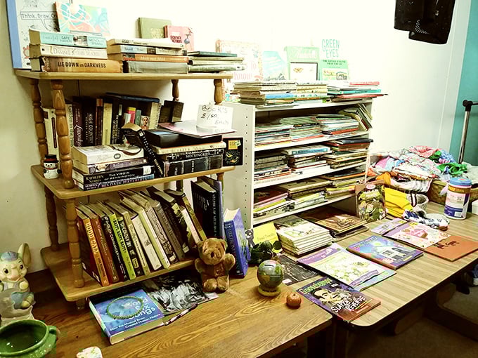 Literary time capsules stacked high, each spine holding decades of stories within stories.