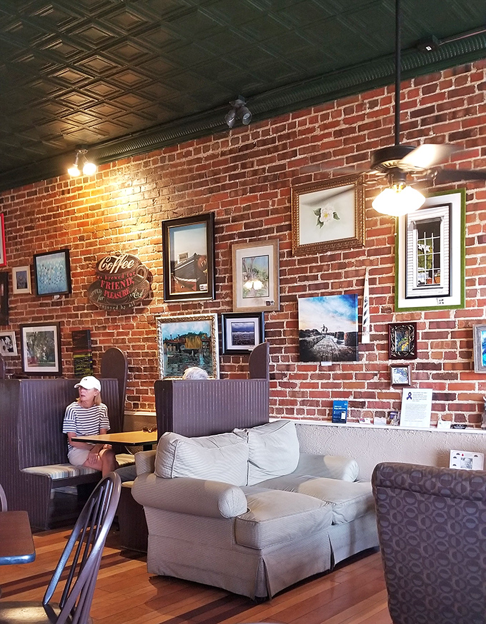 That exposed brick wall gallery tells stories while you eat. The comfy booth seating invites you to stay awhile&mdash;and order dessert.