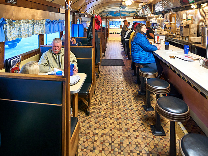 The social architecture of diner life&mdash;where strangers become neighbors over coffee refills and shared condiment caddies.