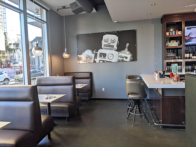 Robot art watches over diners like a mechanical breakfast guardian. Even robots understand the importance of properly executed brunch.