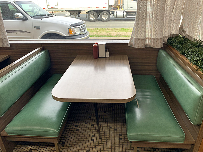 The green vinyl booth&mdash;where countless first dates, business deals, and "I shouldn't have a third burger but watch me" decisions happen.