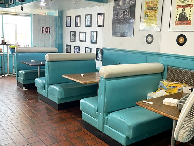 Those turquoise booths have cradled more satisfied customers than a mattress showroom. The color choice? Pure 50s optimism served alongside your meal.