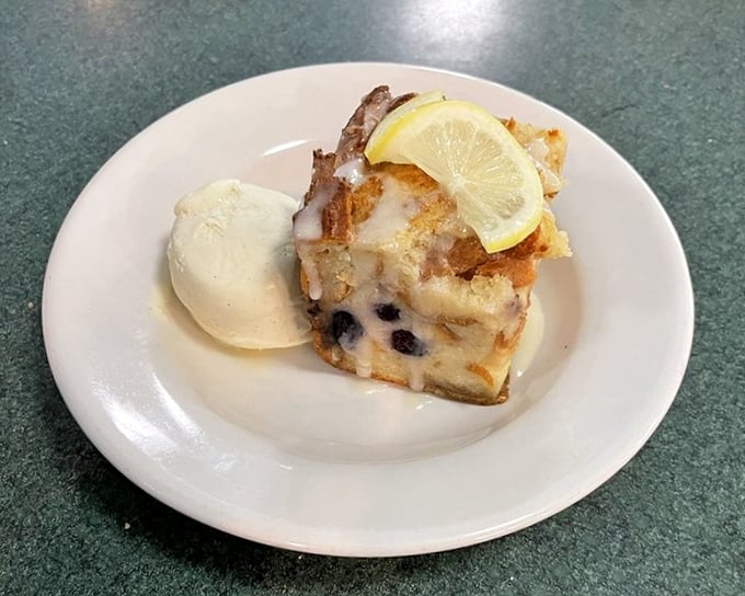 Bread pudding that's having an identity crisis with that lemon slice and ice cream &ndash; dessert that's both homey and sophisticated.